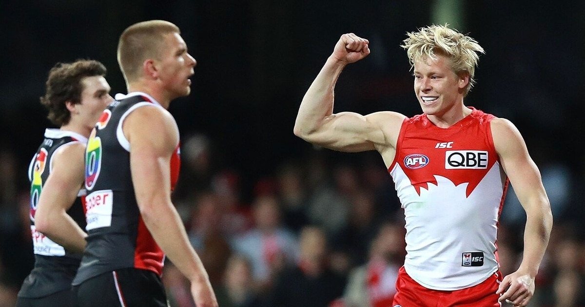 Heeney lays a huge tackle against St Kilda
